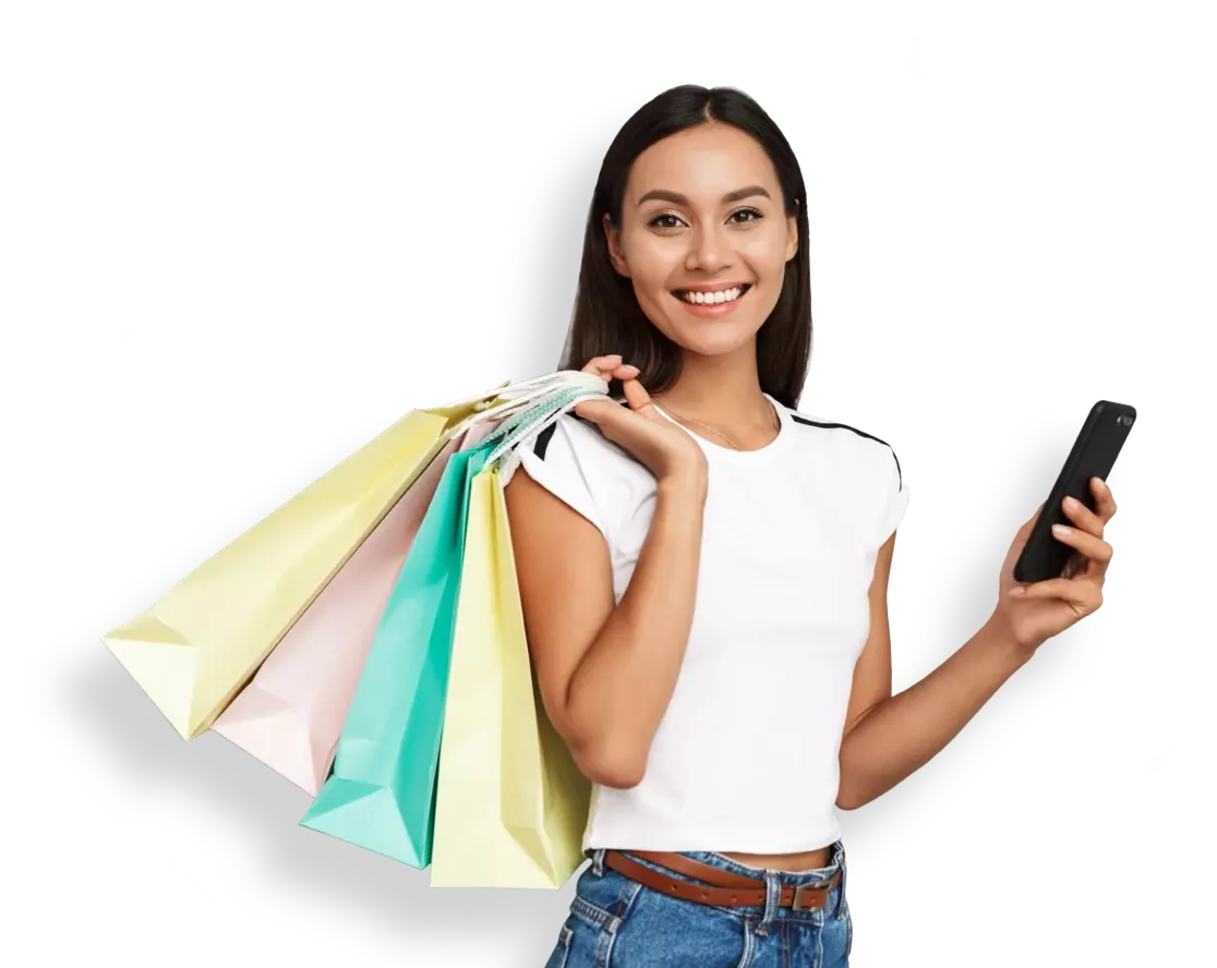 Girl on cell phone with shopping bags